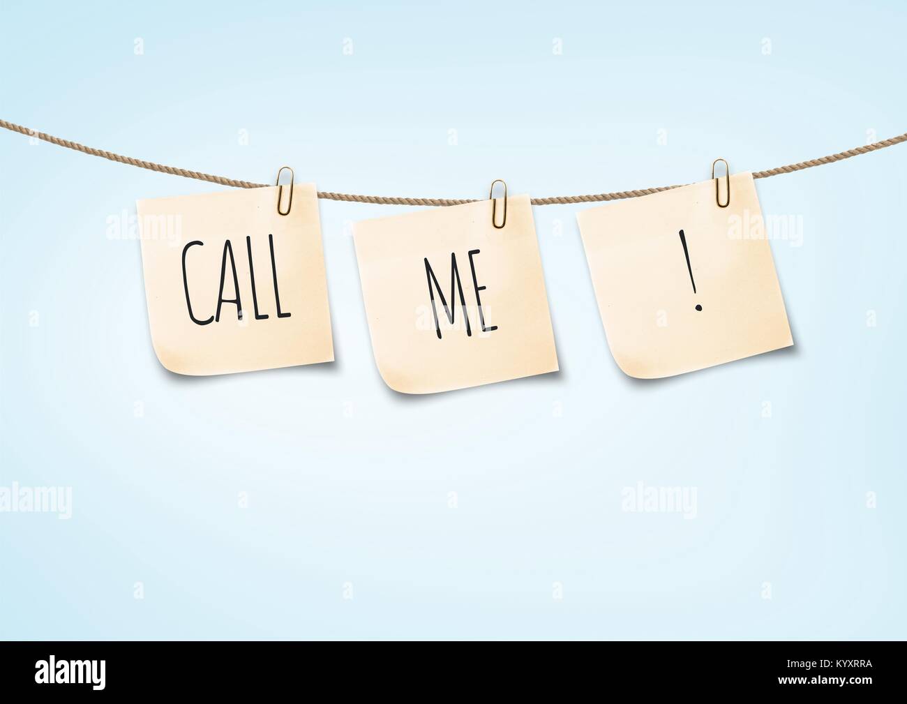 call me text on post it on wash line Stock Photo - Alamy
