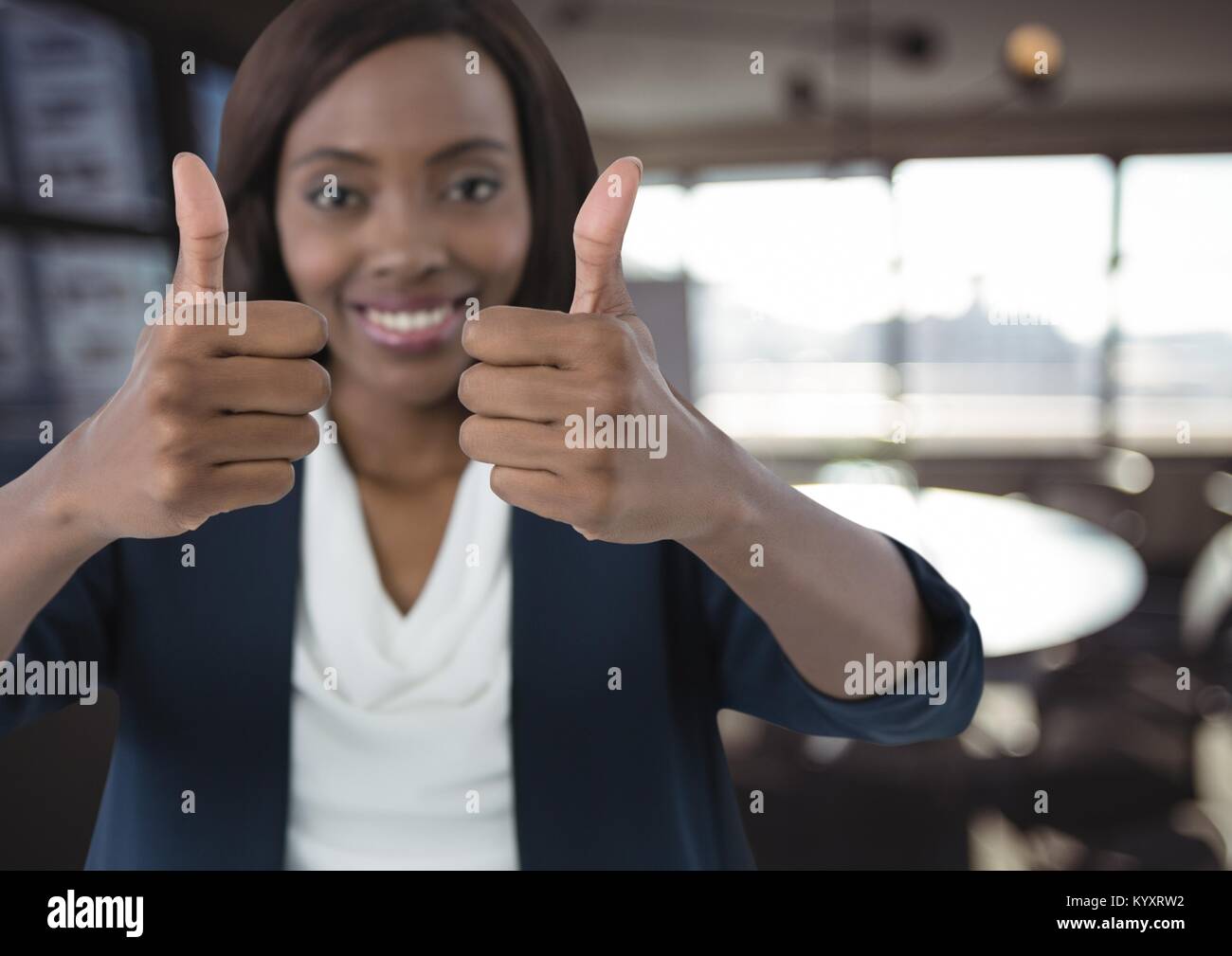woman smiling with thumbs up Stock Photo - Alamy