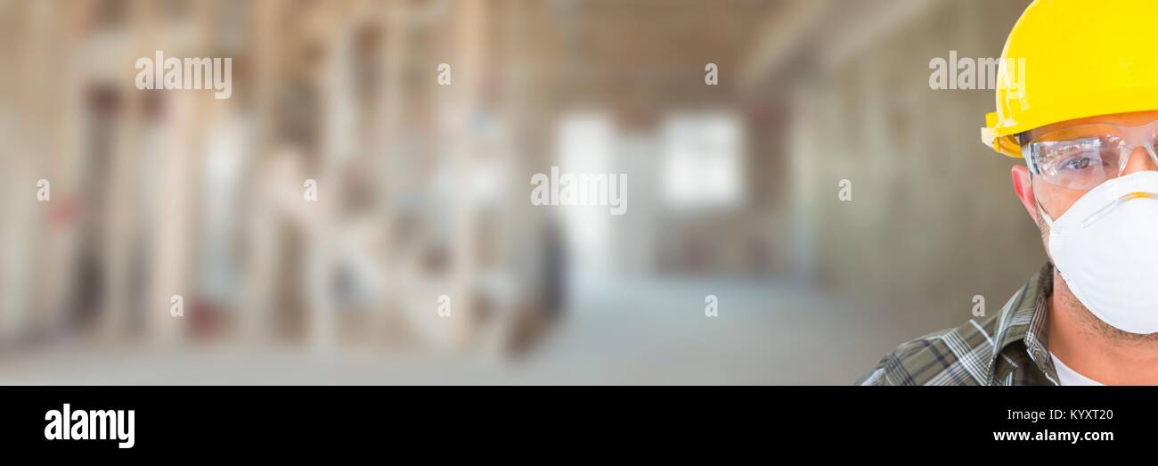 Construction Worker on building site with mask Stock Photo - Alamy