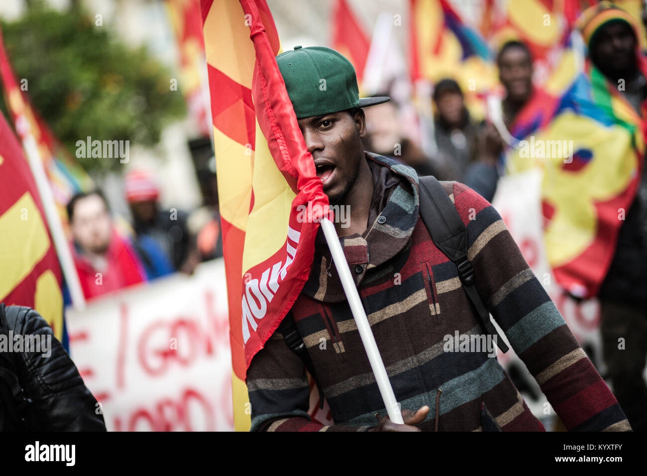 People march in a national demonstration for the rights of migrants ...