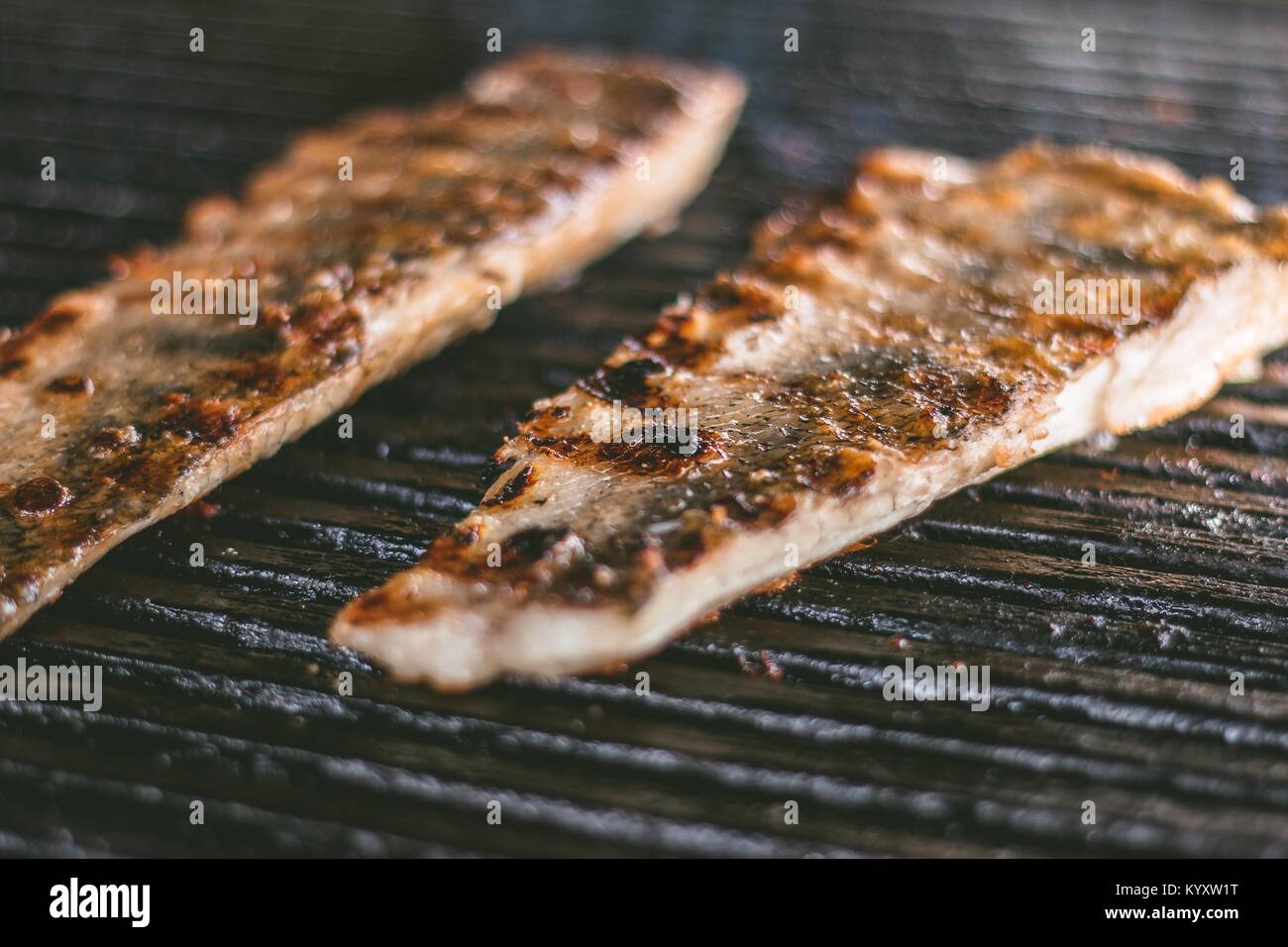 Close up of a delicious grilled fish fillet on barbecue Stock Photo - Alamy