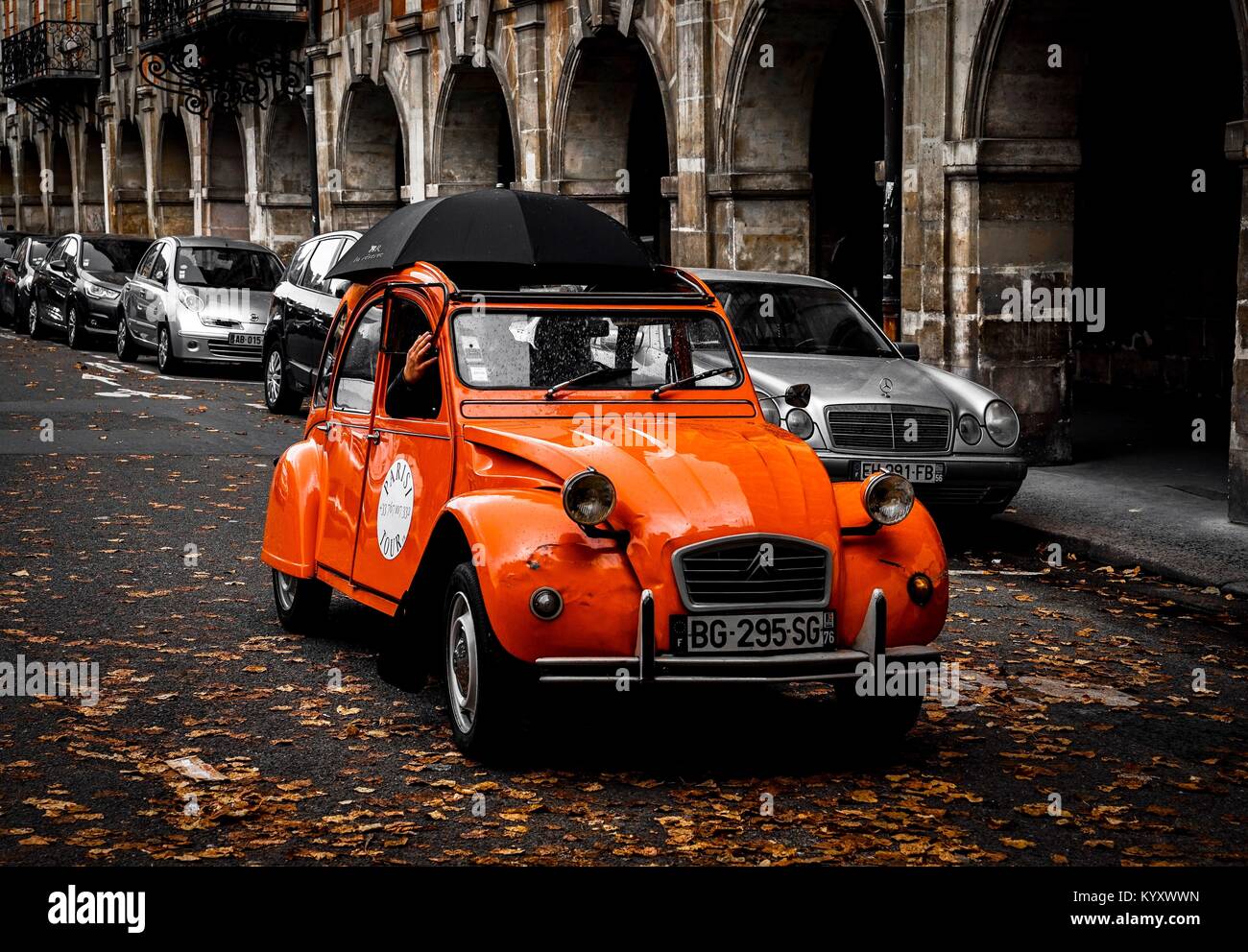 Small car during rain Stock Photo - Alamy
