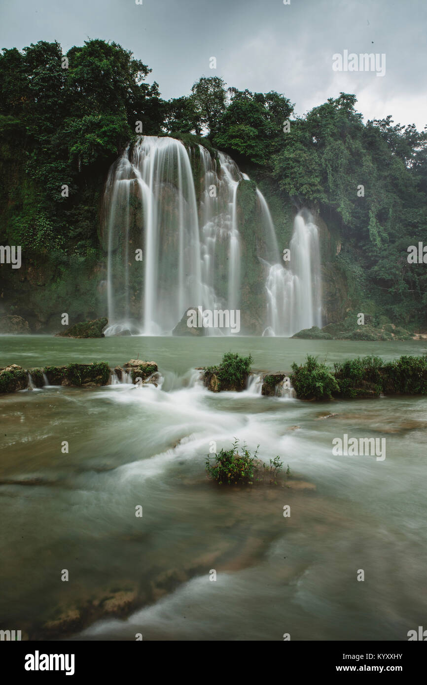 Low angle idyllic view of waterfall Stock Photo - Alamy