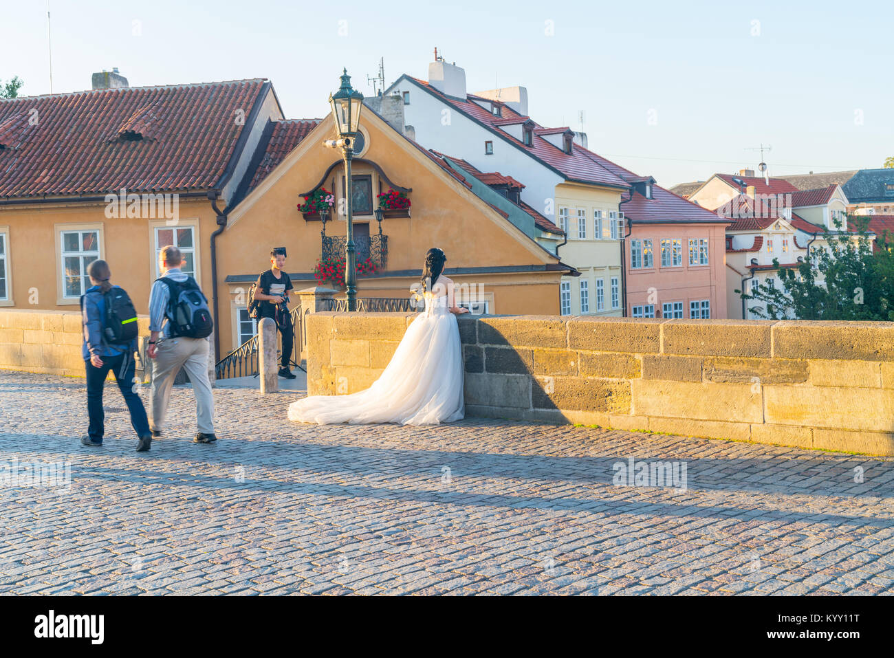 PRAGUE CZECH REPUBLIC - AUGUST 29,2017; Bride in white gown stands at ...