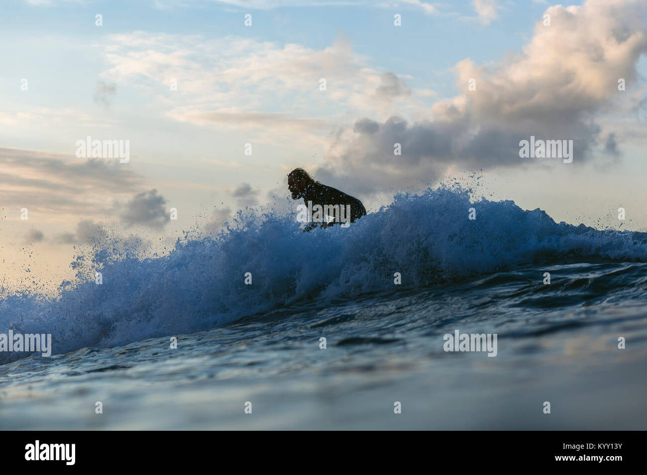Waves man standing sea sunset hi-res stock photography and images - Alamy