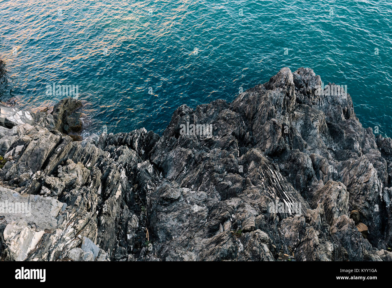 High angle view of cliff by sea Stock Photo - Alamy