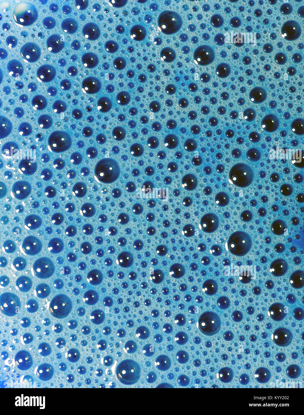 Closeup macro of toxic blue soap bubbles on water surface Stock Photo ...