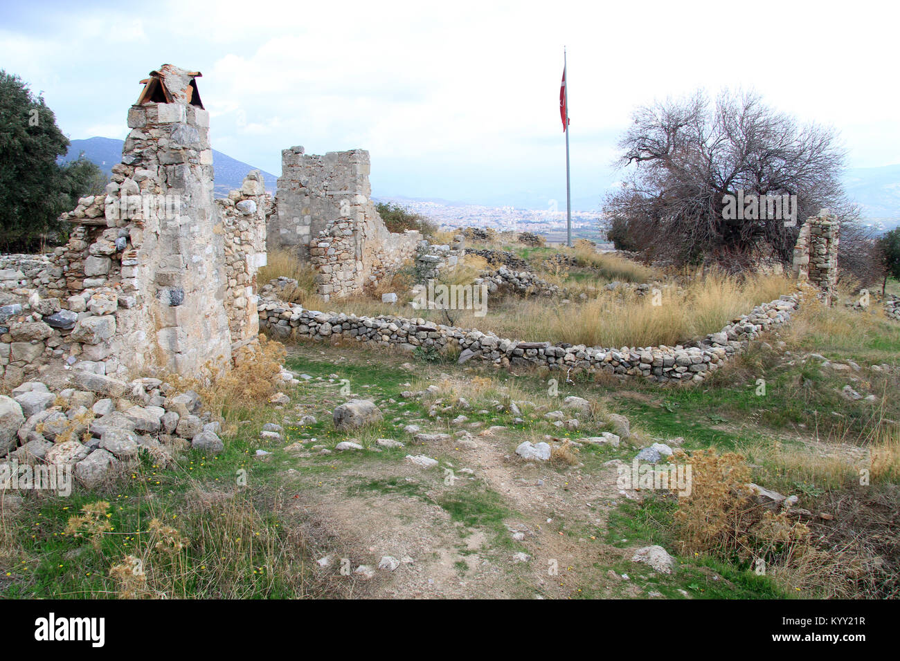 Ruins of fortress with flag near Milas, Turkey Stock Photo - Alamy