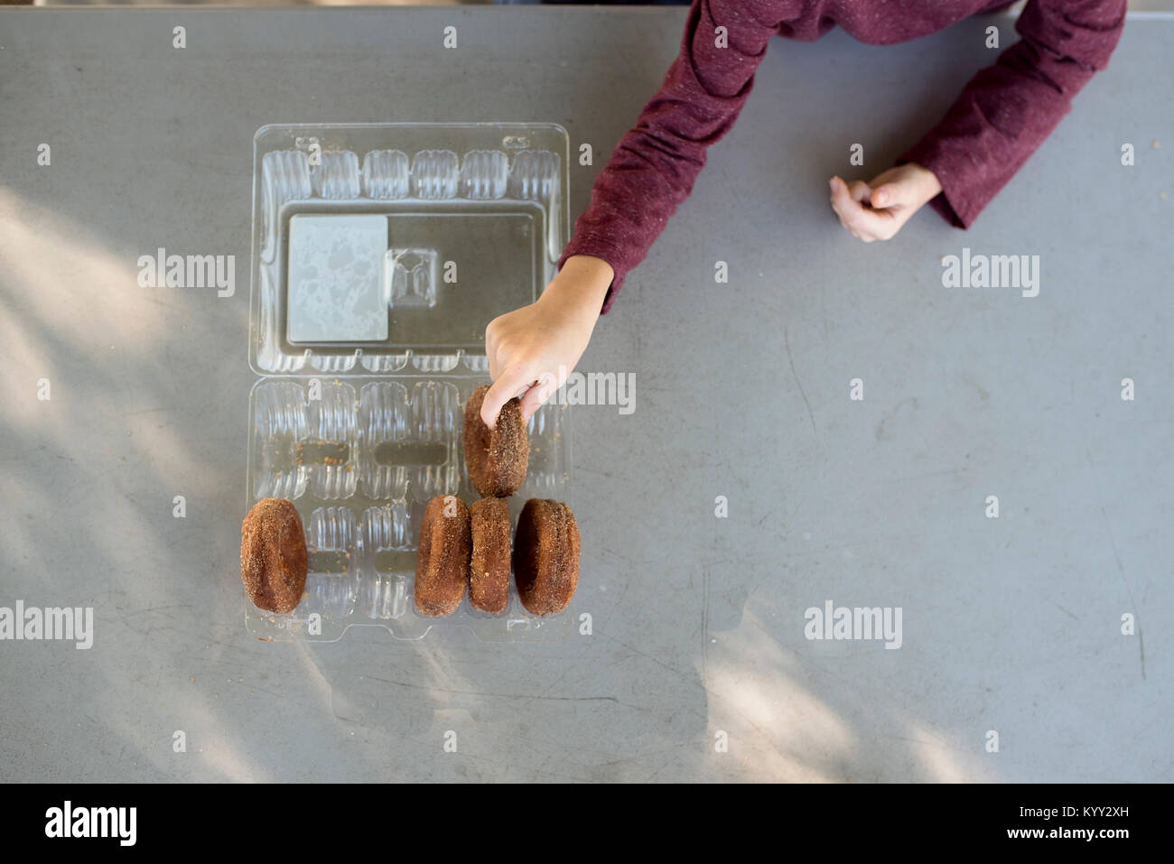 Overhead view hands taking hi-res stock photography and images - Alamy