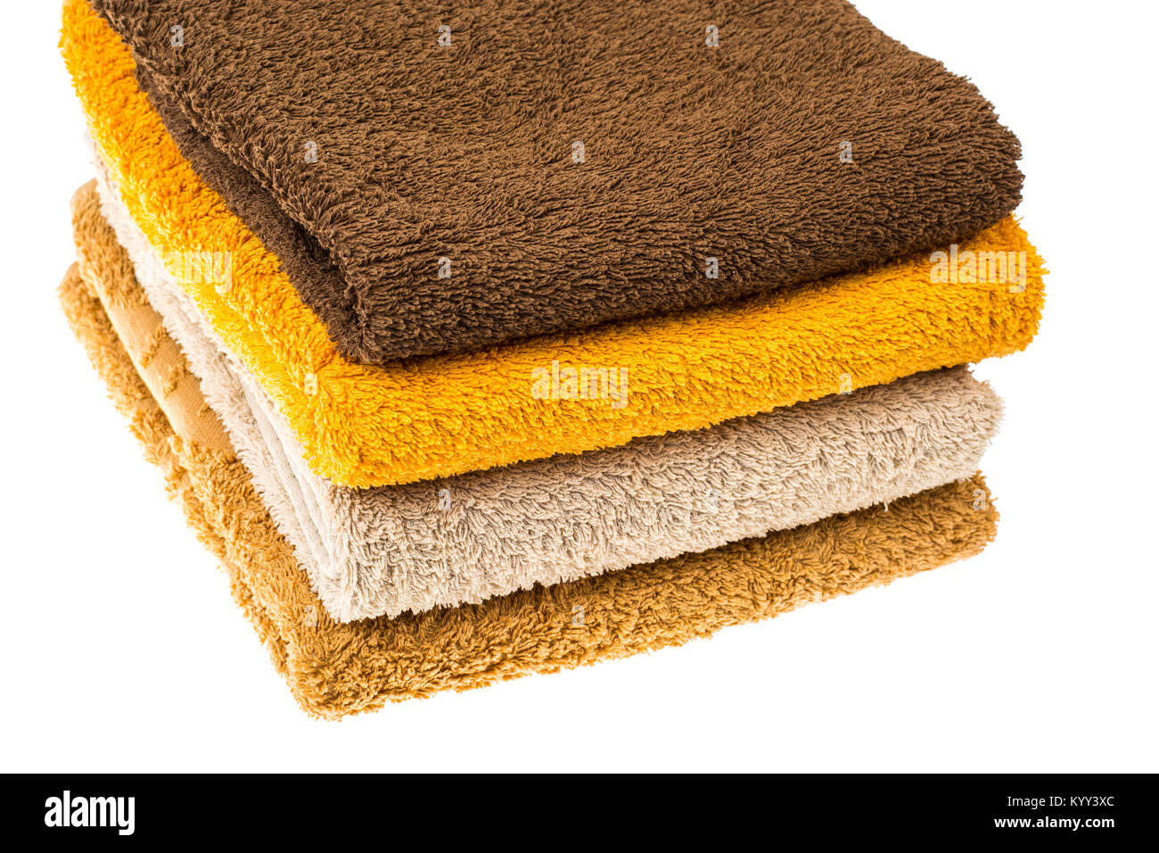 Stack of towels of different colors on white background. Studio Photo ...