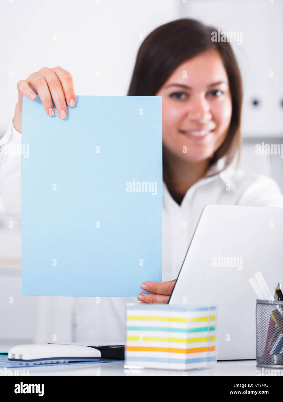Female employee having a productive day at work in office Stock Photo ...