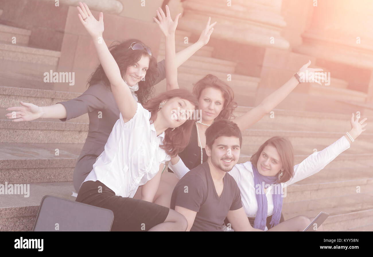 group of happy university students in front of university building ...