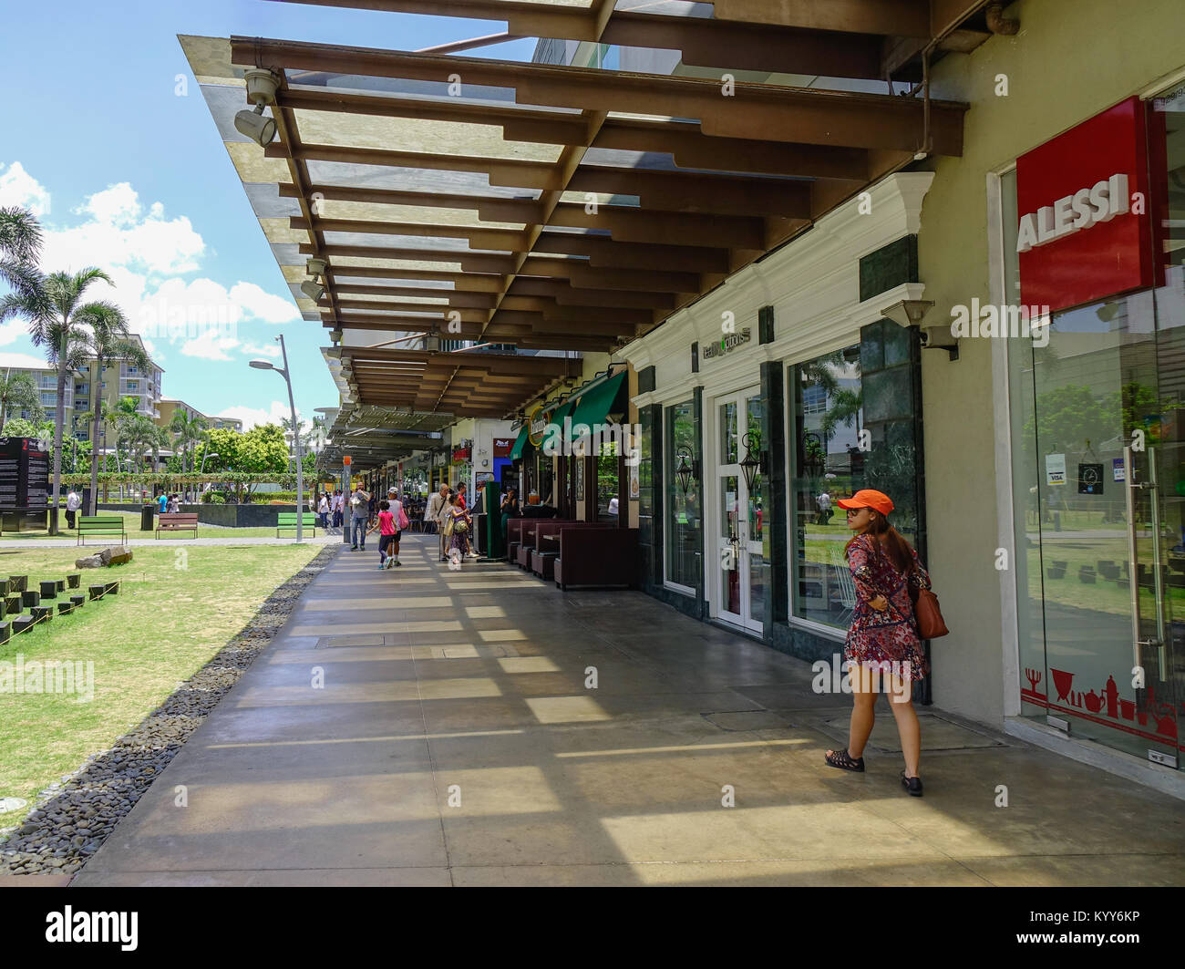 Manila, Philippines - Apr 13, 2017. People walking on a shopping street ...