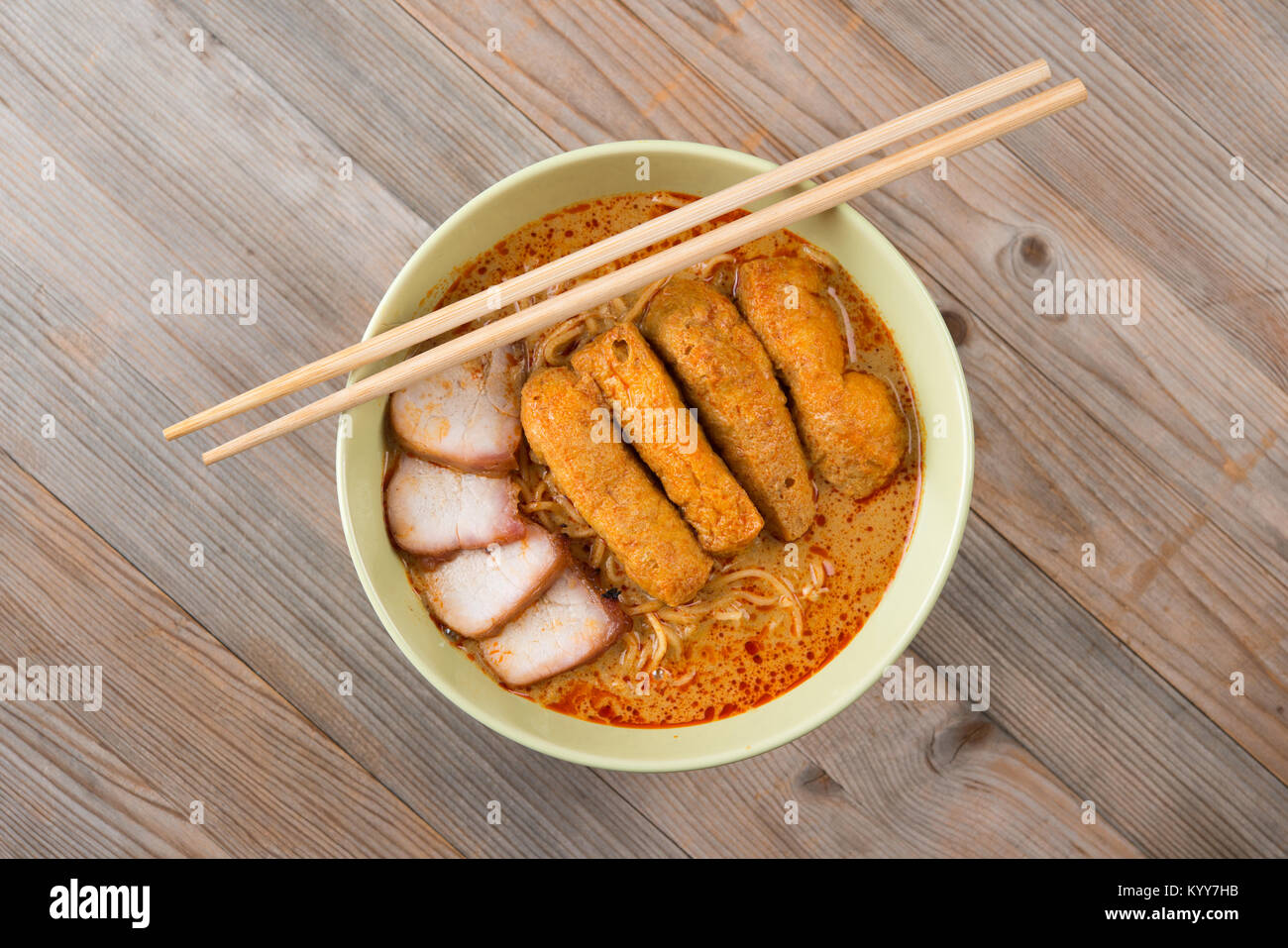 Top view Curry laksa, a popular spicy dish in Malaysia cuisine Stock ...