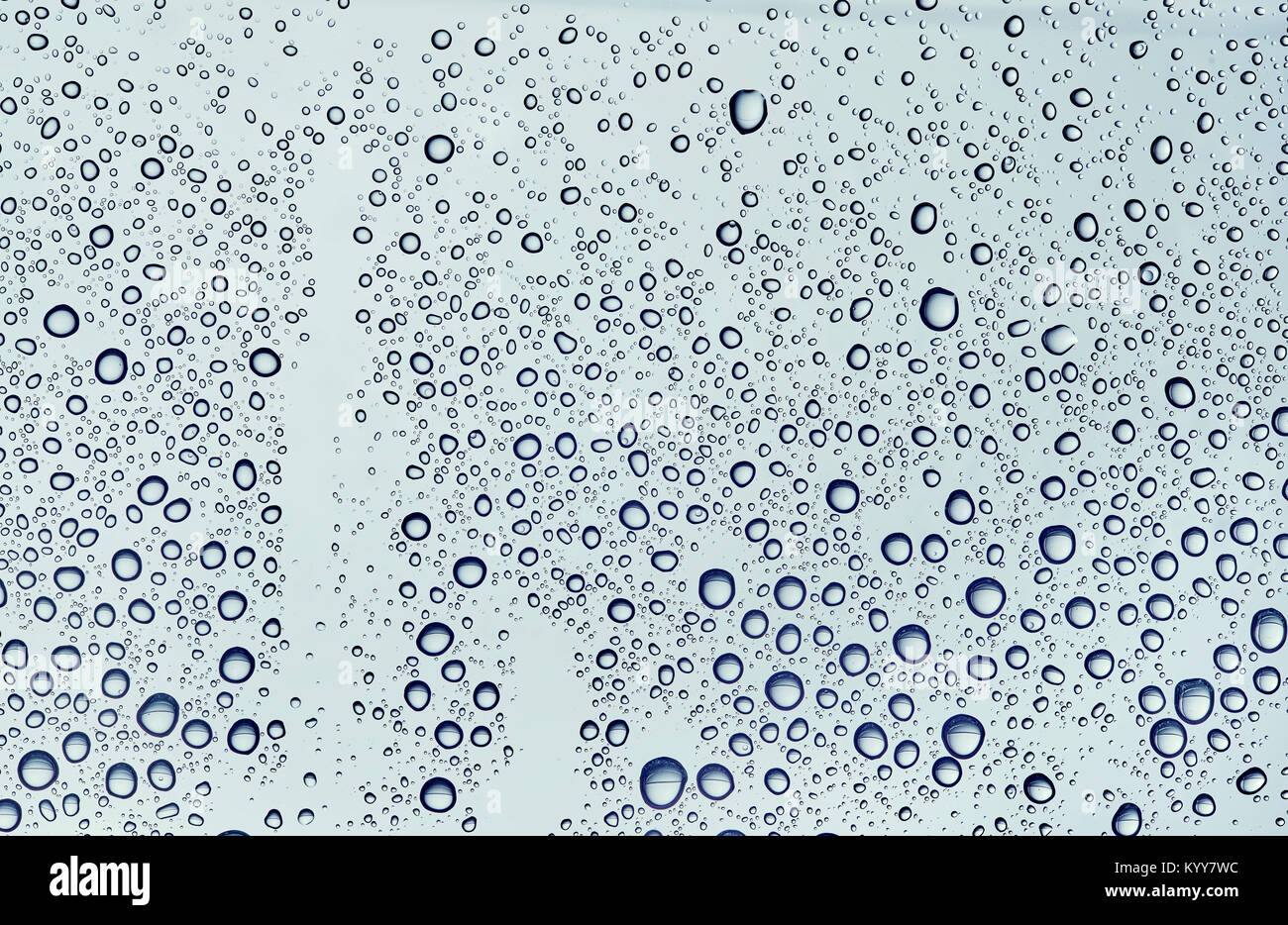 waterdrops against a window on white background Stock Photo - Alamy