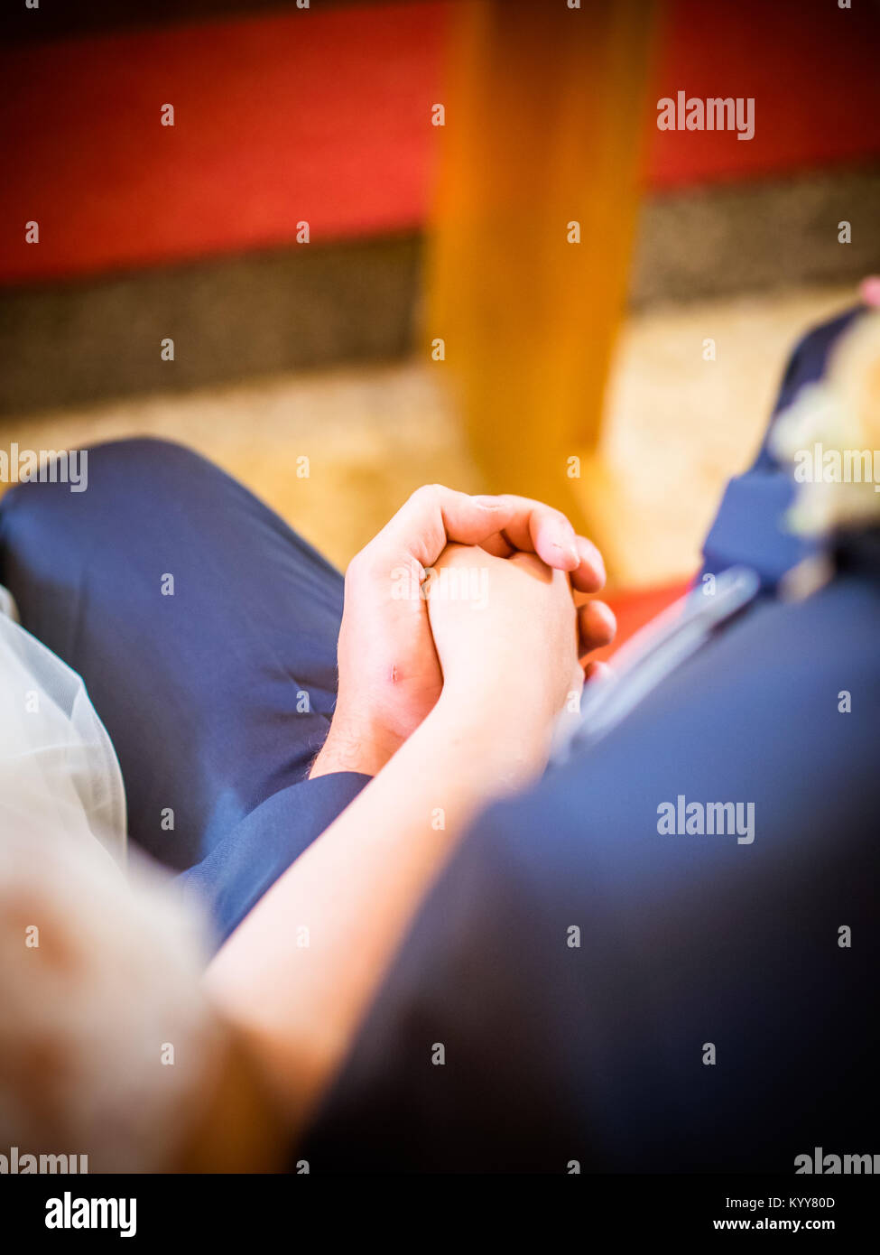 Wedding scene - loving couple hand in hand Stock Photo - Alamy