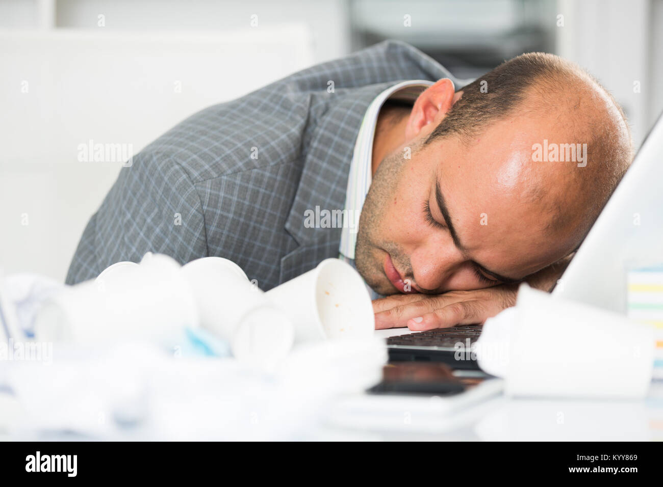 Young sad man tired of working and sleeping in the modern office Stock ...