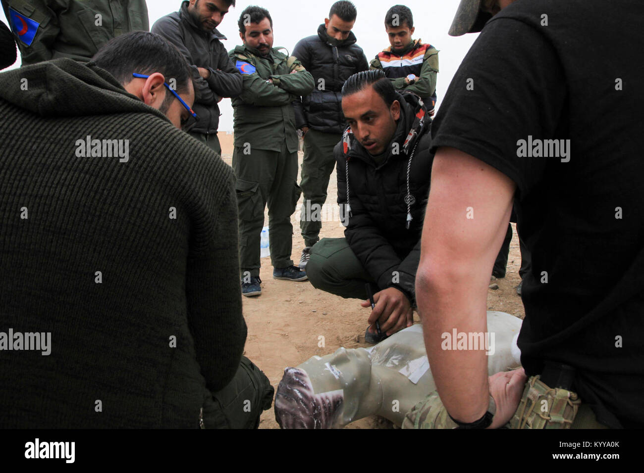 A medic in the Raqqah Internal Security Force (RISF) demonstrates how ...