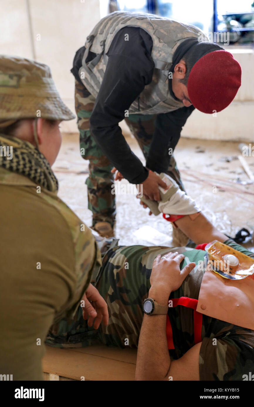 Australian Army Cpl. Jess Edwards assesses an Iraqi Army 57th Brigade ...