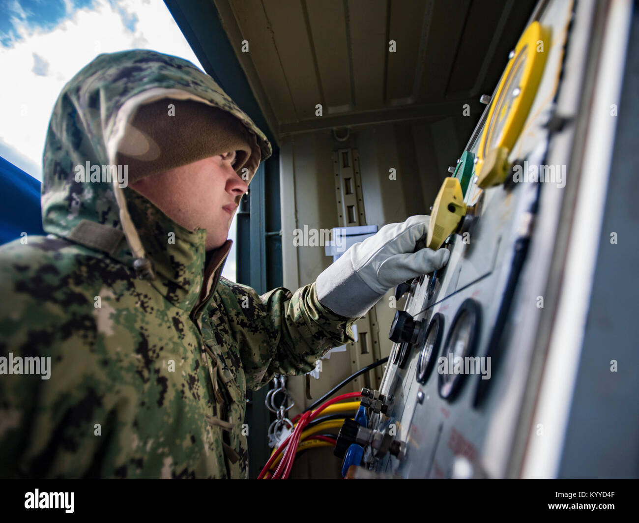 U.S. Navy Construction Mechanic 3rd Class Lucas Jackson, assigned to ...