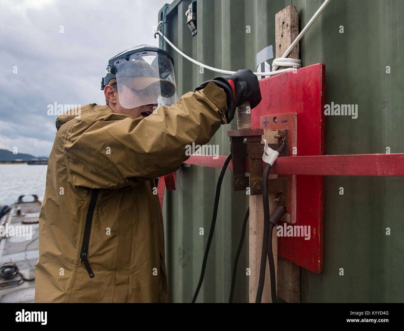 U.S. Navy Utilitiesman 2nd Class James Rieger, assigned to Underwater ...