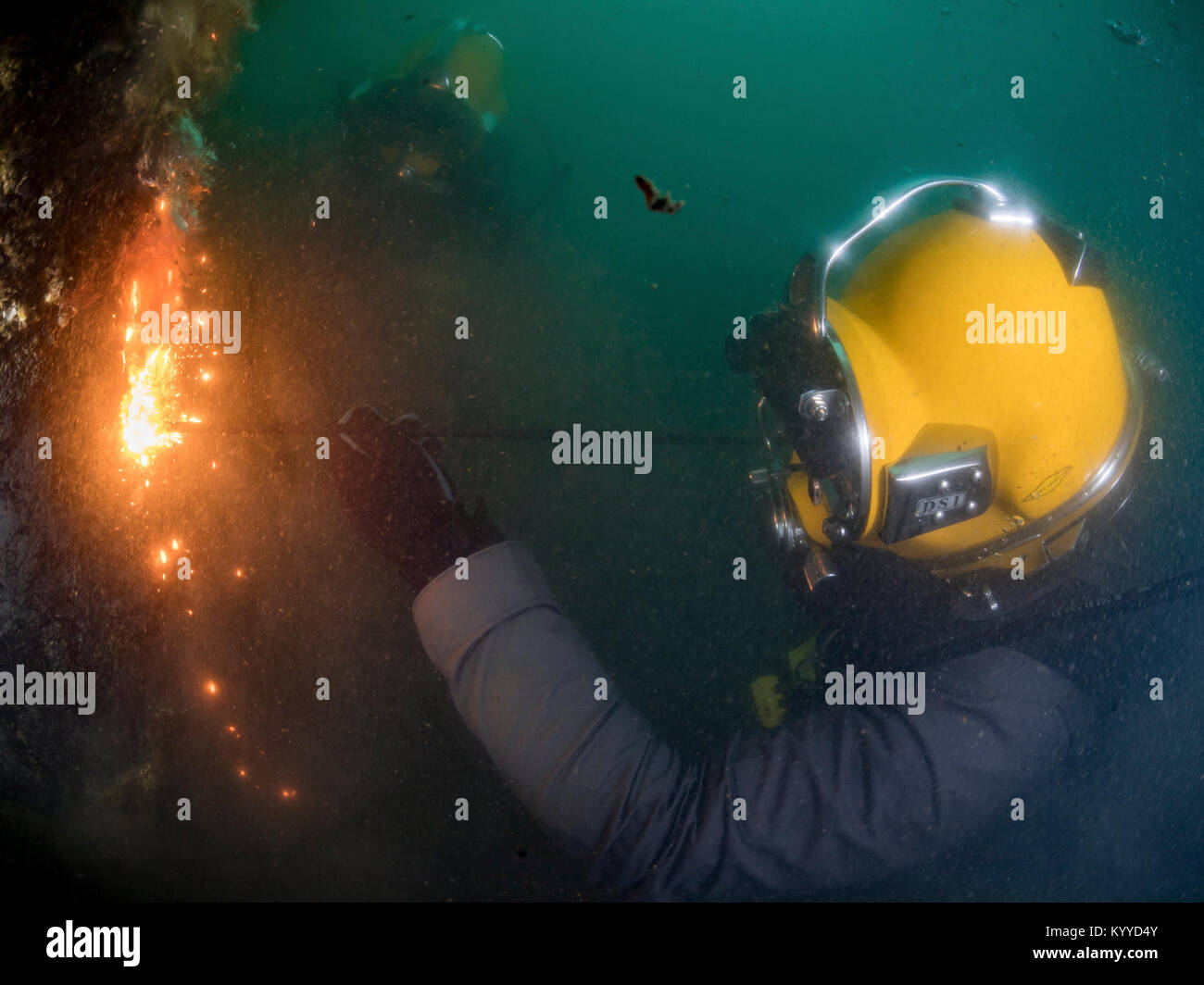 U.S. Navy Builder 2nd Class Sean McHugh, assigned to Underwater ...