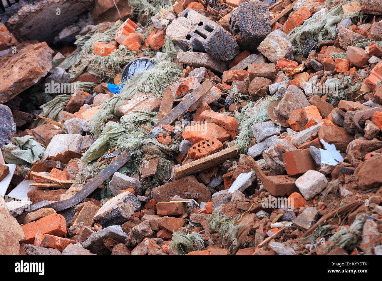 A pile of construction debris is broken brick and concrete Stock Photo ...