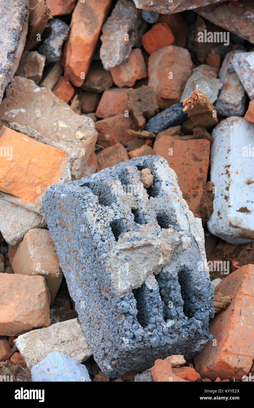 A pile of construction debris is broken brick and concrete Stock Photo ...