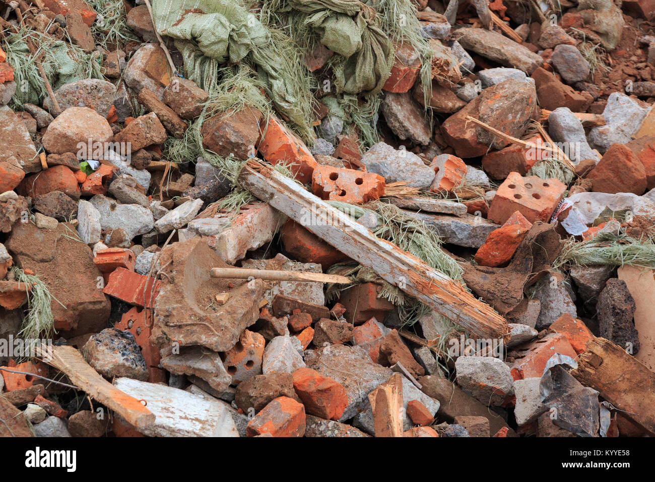 A pile of construction debris is broken brick and concrete Stock Photo ...