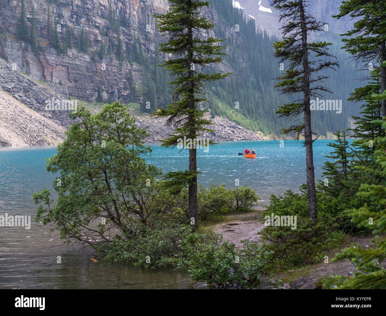 Tourists boating in Moraine Lake, Banff National Park, Alberta, Canada ...