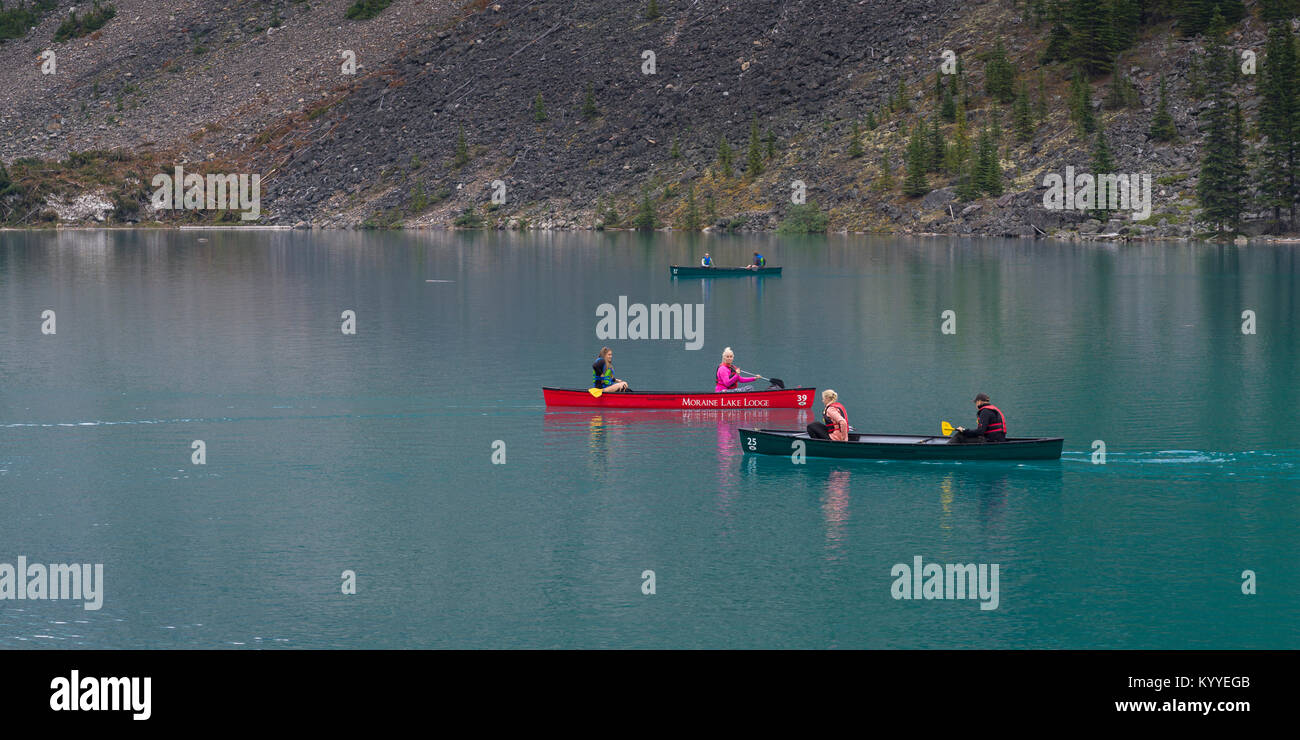 Tourists boating in Moraine Lake, Banff National Park, Alberta, Canada ...