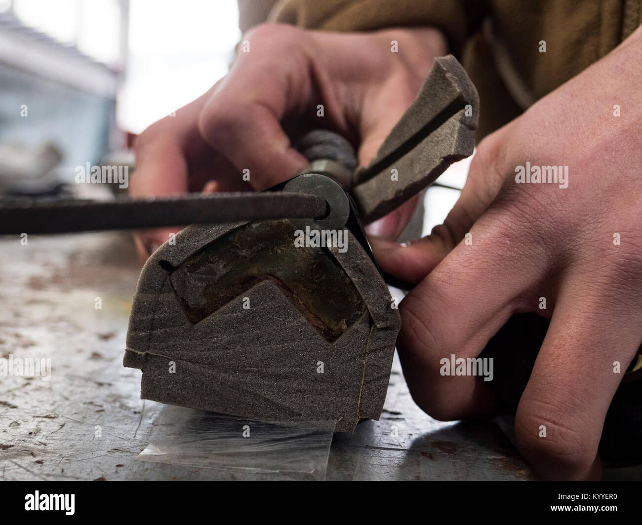 A U.S. Navy Seabee, assigned to Underwater Construction Team (UCT) 2 ...