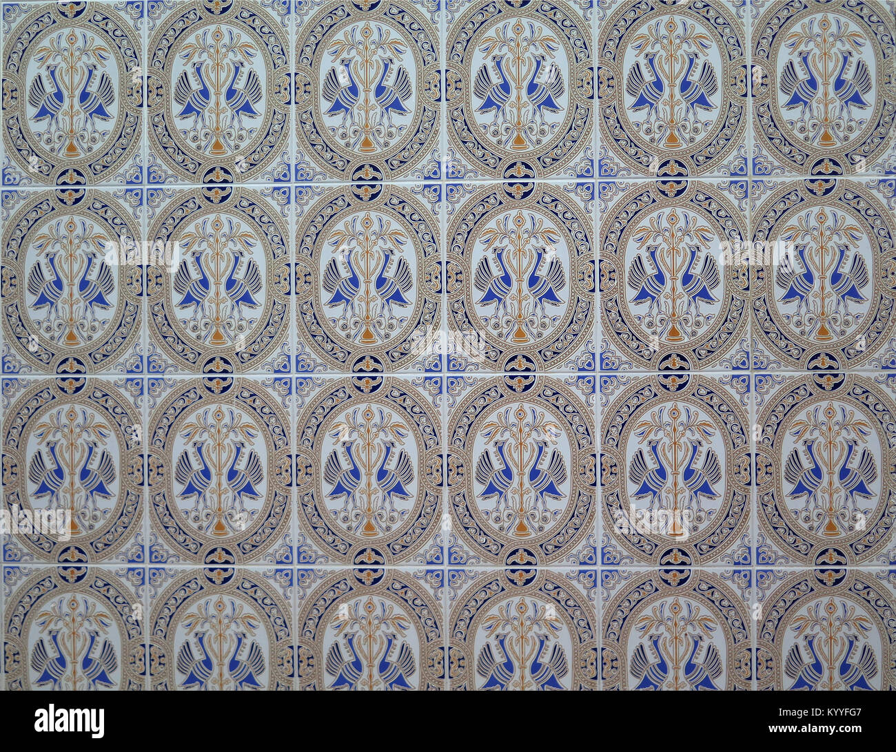 Closeup of Wall tiled with colorful ceramic tiles in village in ...