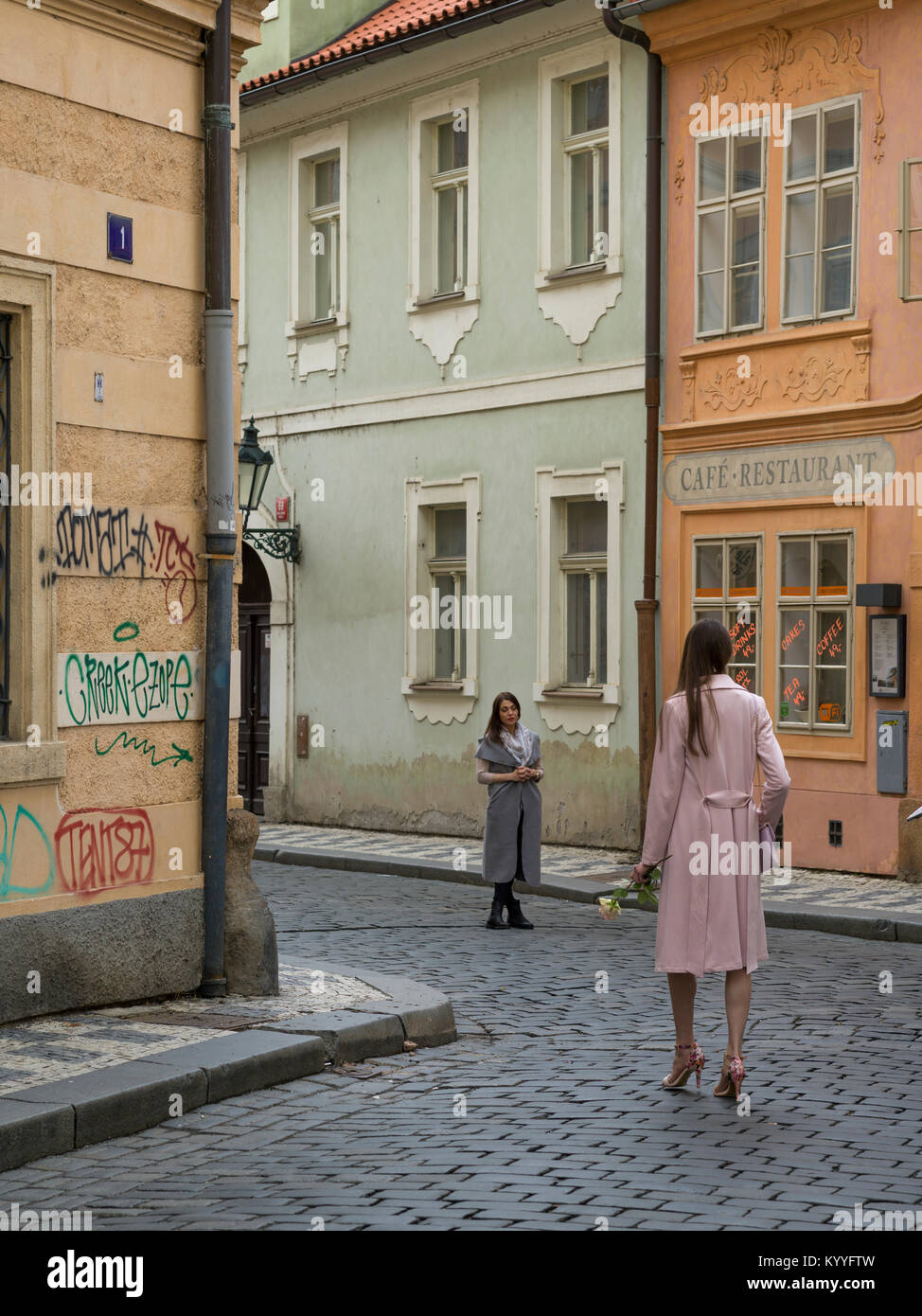 Two women standing on street, Prague, Czech Republic Stock Photo - Alamy