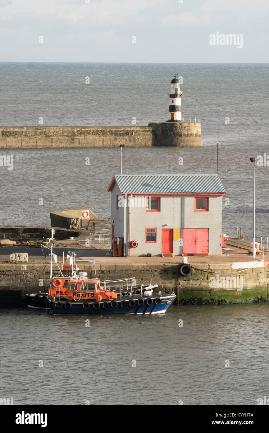Pilot boats and lighthouse, Seaham Harbour, County Durham, England, UK ...