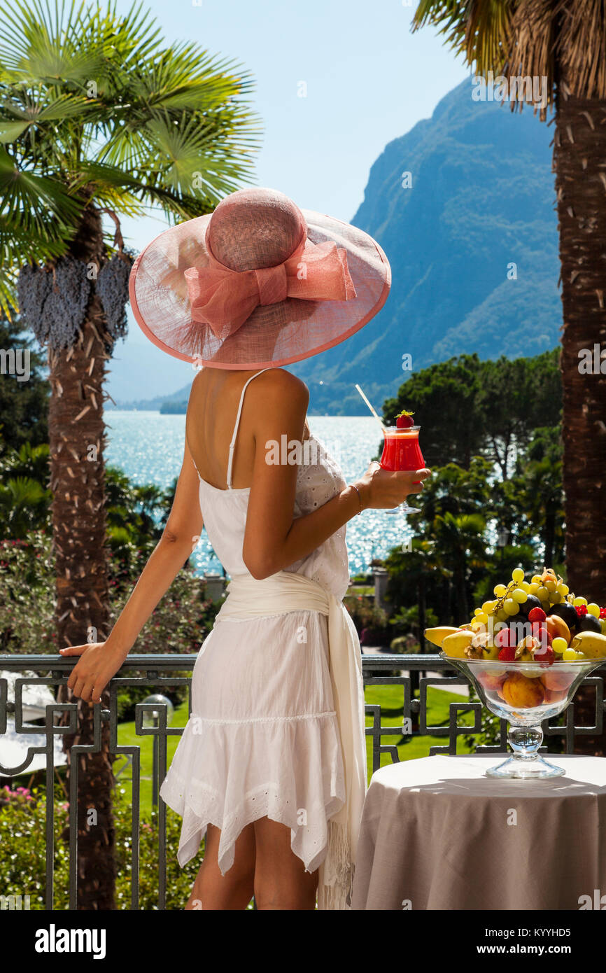 portrait of beautiful woman on the terrace of prestigious hotel Stock ...