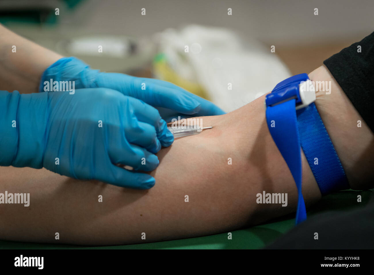 Process of giving blood including syringe injection Stock Photo - Alamy