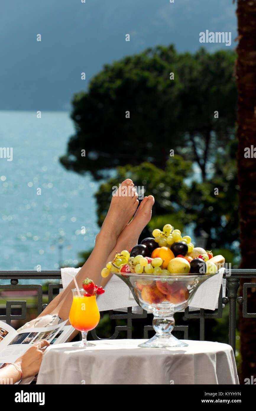 portrait of beautiful woman on the terrace, back view Stock Photo - Alamy