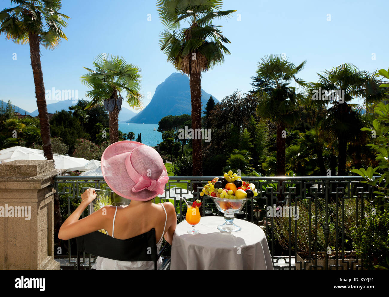 portrait of beautiful woman on the terrace of prestigious hotel Stock ...