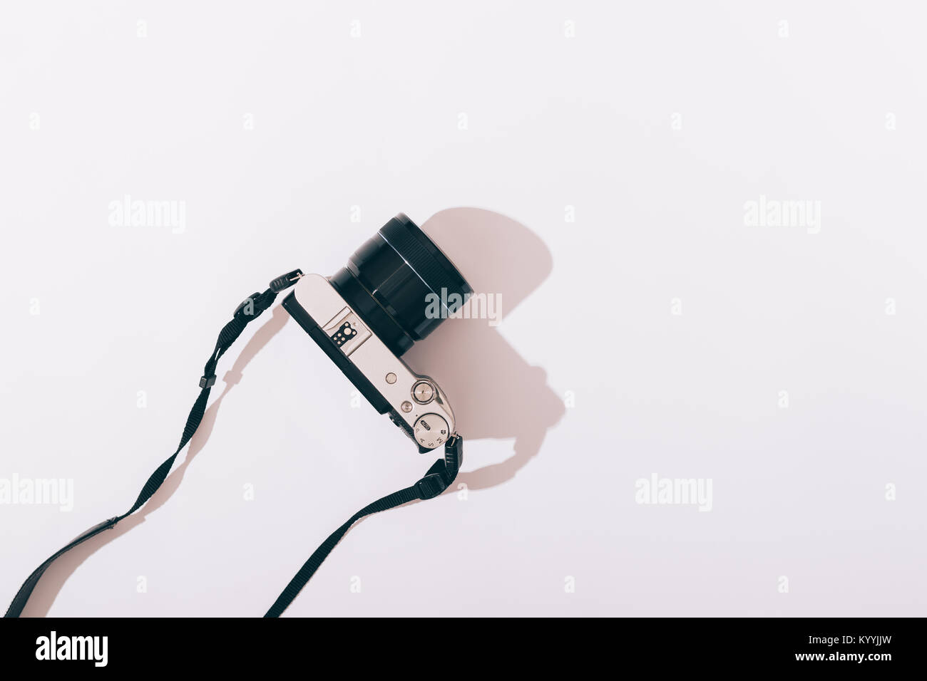 Retro camera on white background top view Stock Photo - Alamy