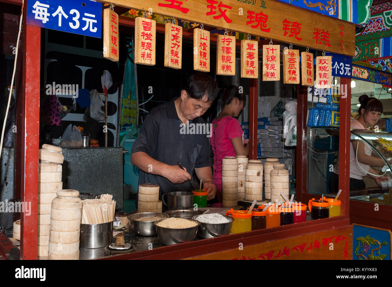 Xian, China - August 5, 2012: A food stall in a street of the Muslim ...