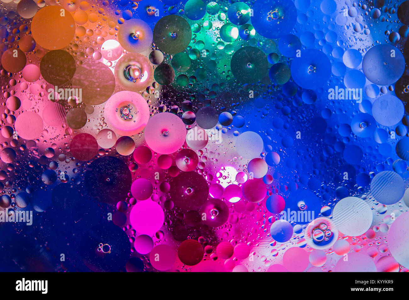 Colorful abstract macro background with oil drops in water Stock Photo ...