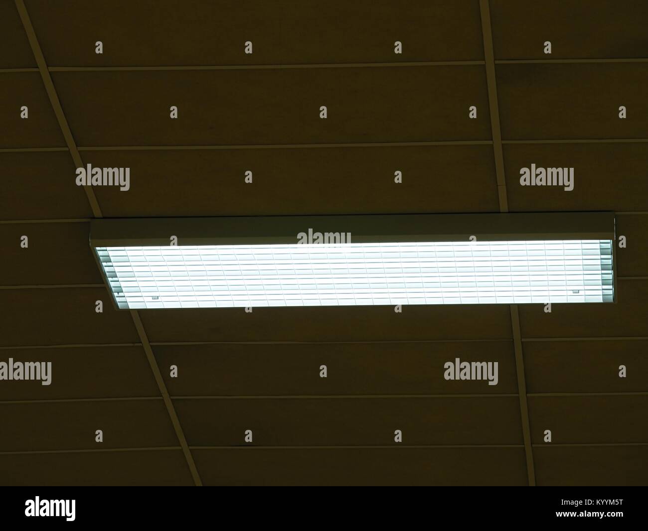Lighting ceiling panels. Fluorescent lamps on the modern ceiling ...