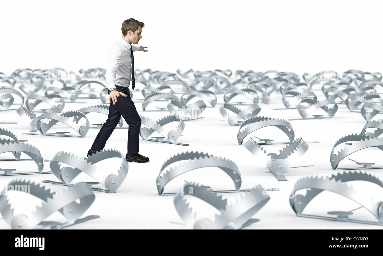 man try to walk in the middle of bear traps dange concept Stock Photo ...