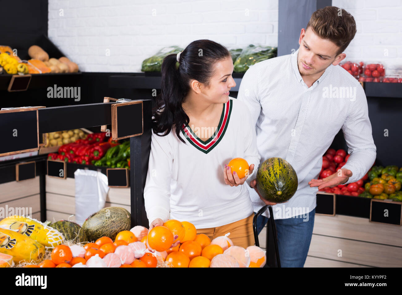 Young woman two melons hi-res stock photography and images - Alamy