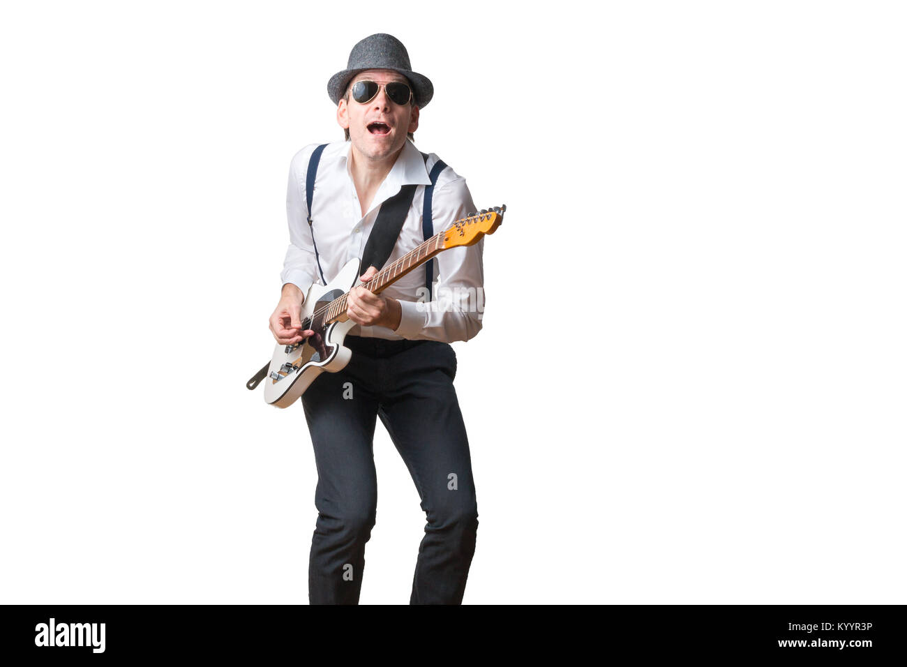 Man with hat and sunglasses plays electric guitar and sings Stock Photo ...
