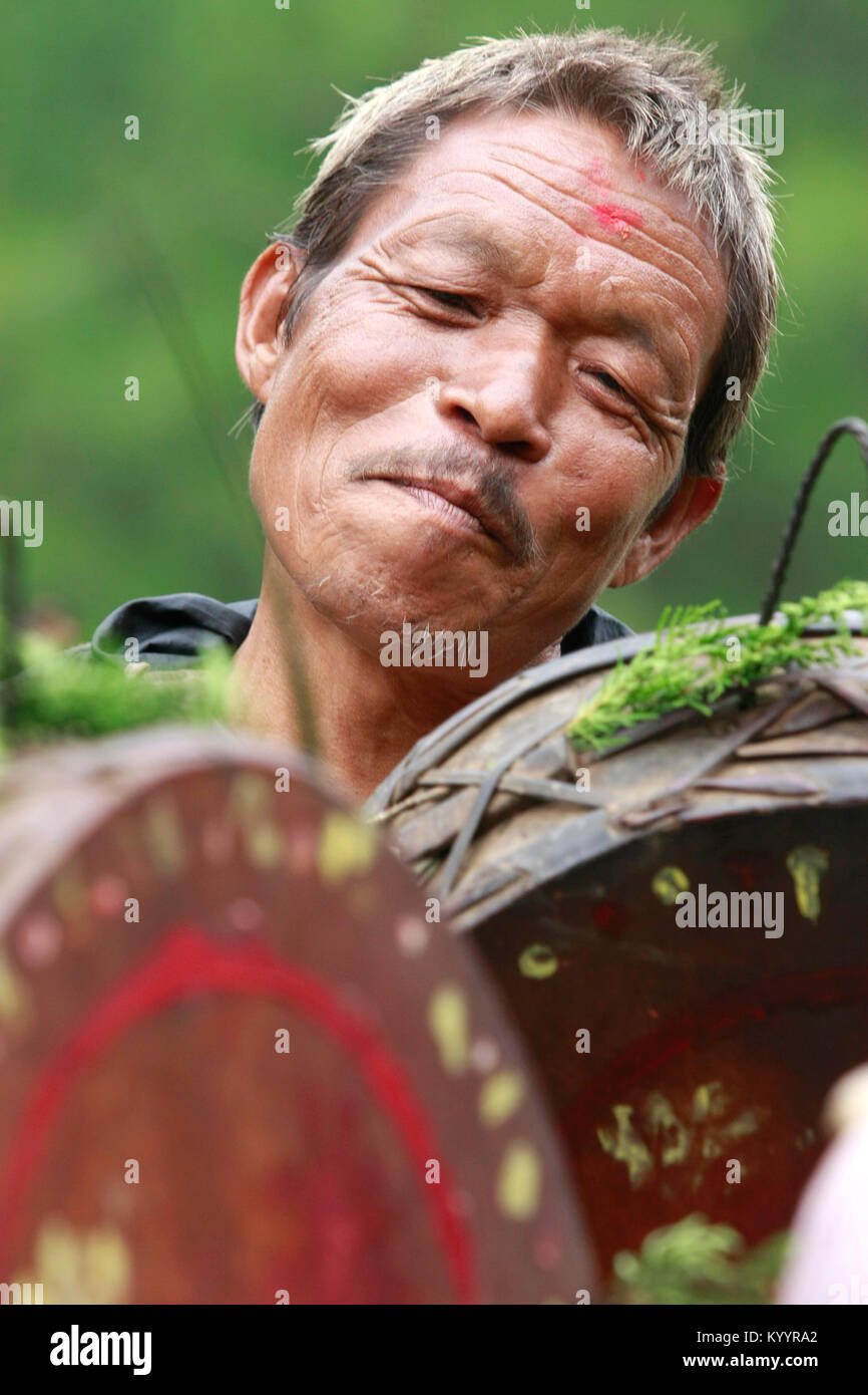 A Shaman singing and drumming in Gosainkunda, Kavre, Nepal Stock Photo ...