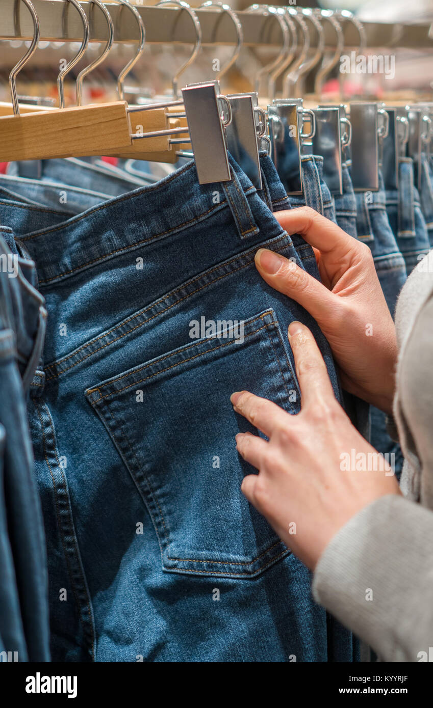 Closeup female hand choosing fabric hi-res stock photography and images ...