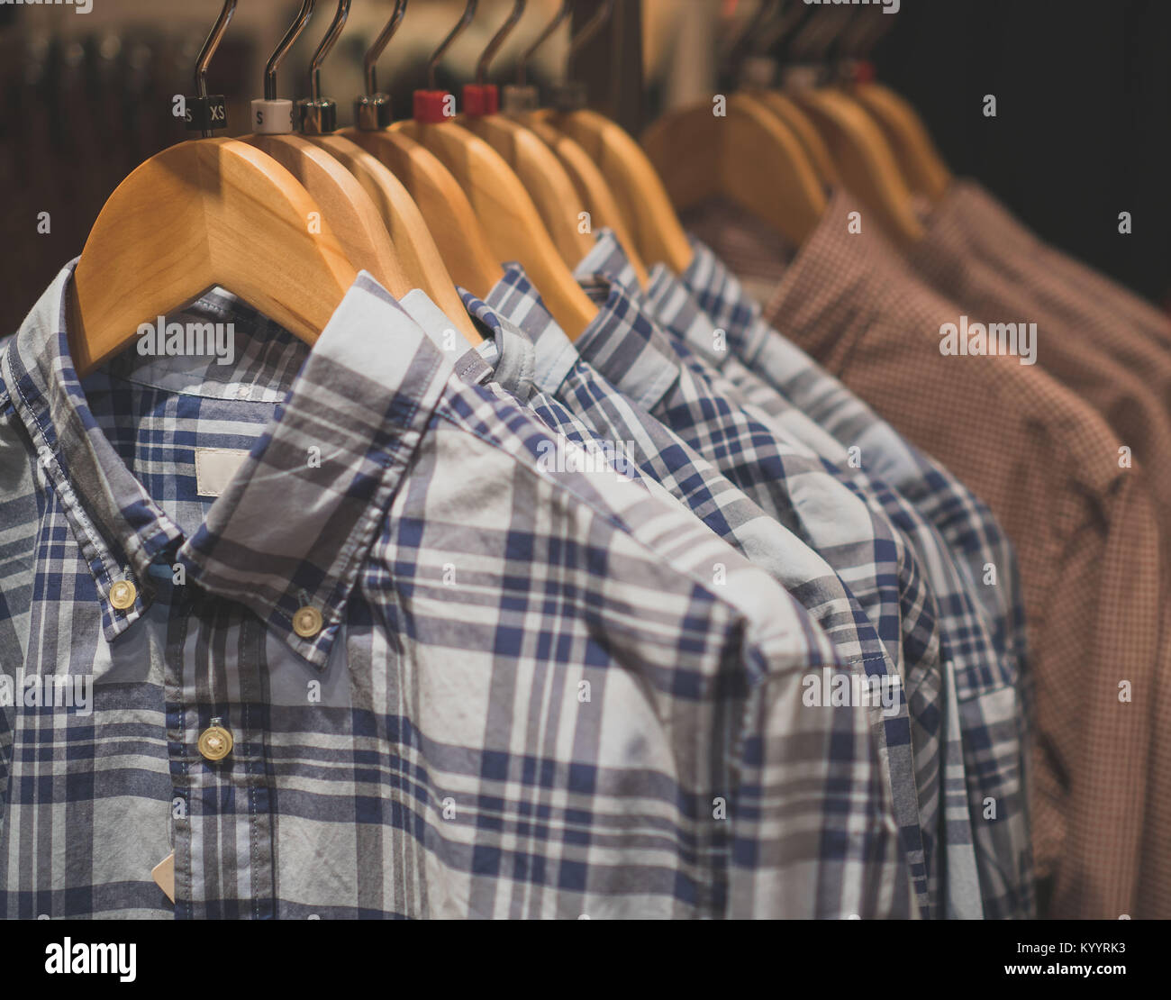 Men's shirts in a clothing store Stock Photo - Alamy