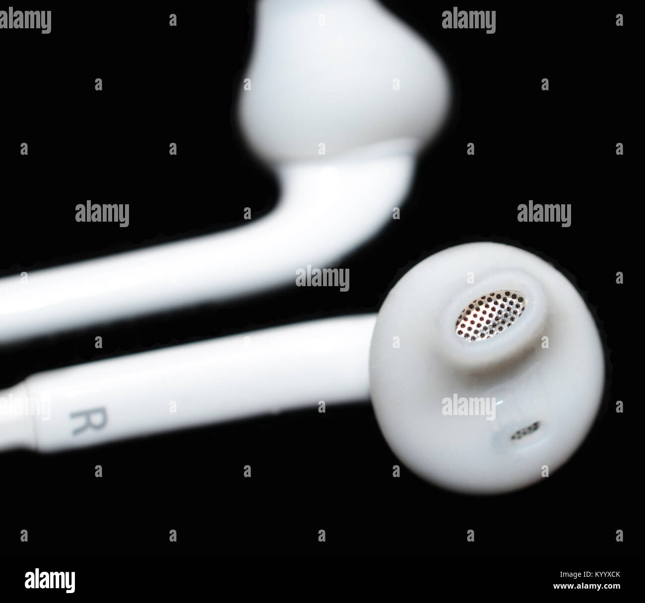 Ear bud cord hi-res stock photography and images - Alamy